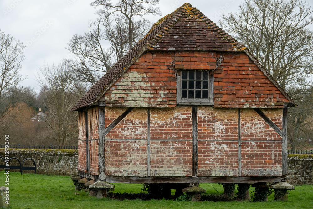 A Tudor barn in the grounds of Cowdray Ruins Midhurst West Sussex ...