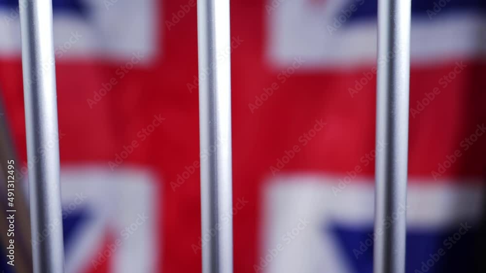 Prison bars with Union jack British flag background Stock 비디오 | Adobe Stock
