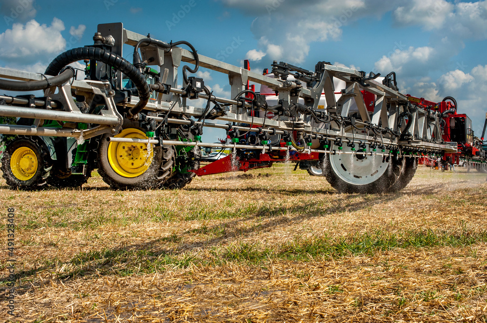 Belogorye, Khmelnytsky region, UKRAINE - August 19, 2021: tractor with ...