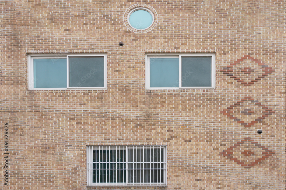 window frame installed on the wall of a building Stock-Foto | Adobe Stock