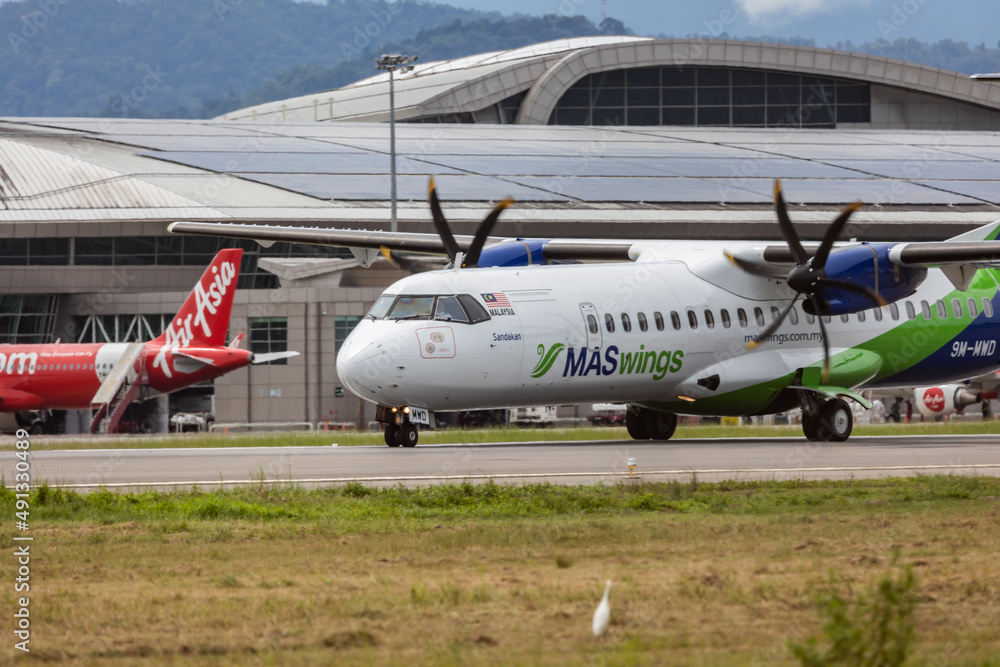 Maswing Airlines ATR-72-500 are ready to take off from Kota Kinabalu ...