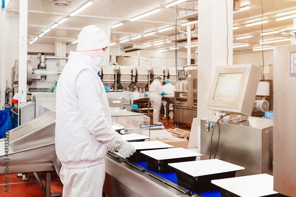 Production line packaging and cutting of meat.Food products meat ...
