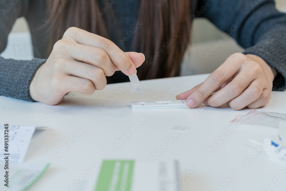 Pandemic of disease, asian young woman, girl hand holding atk, antigen ...