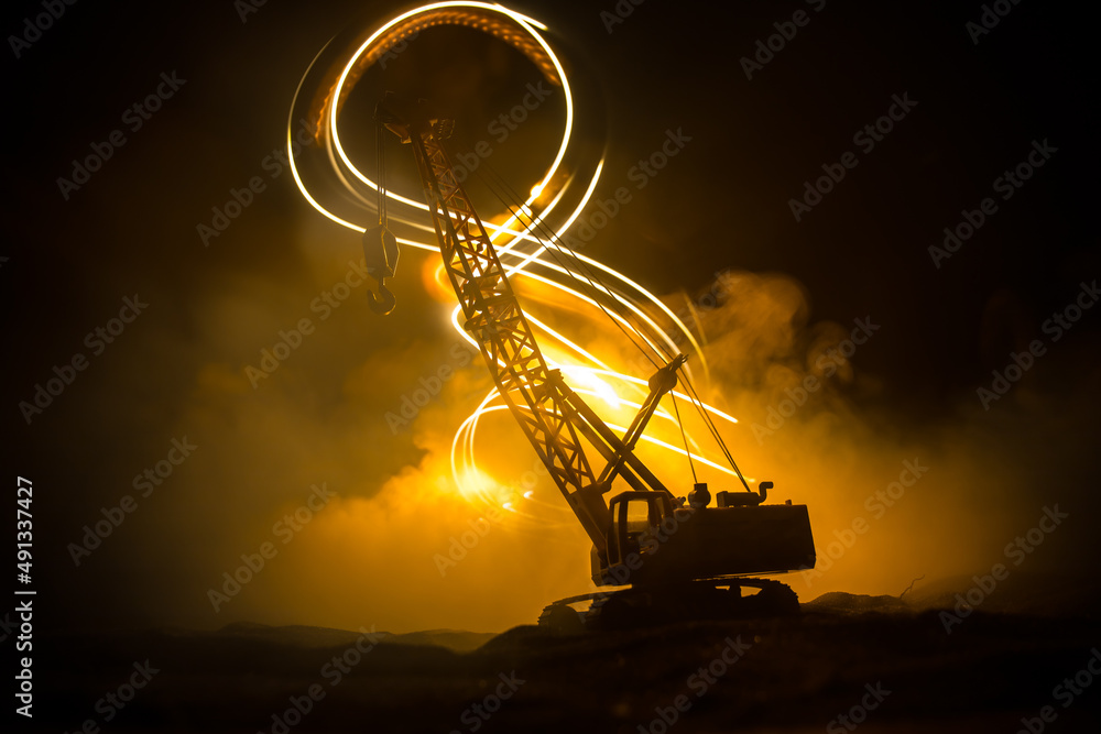 Abstract Industrial background with construction crane silhouette over ...
