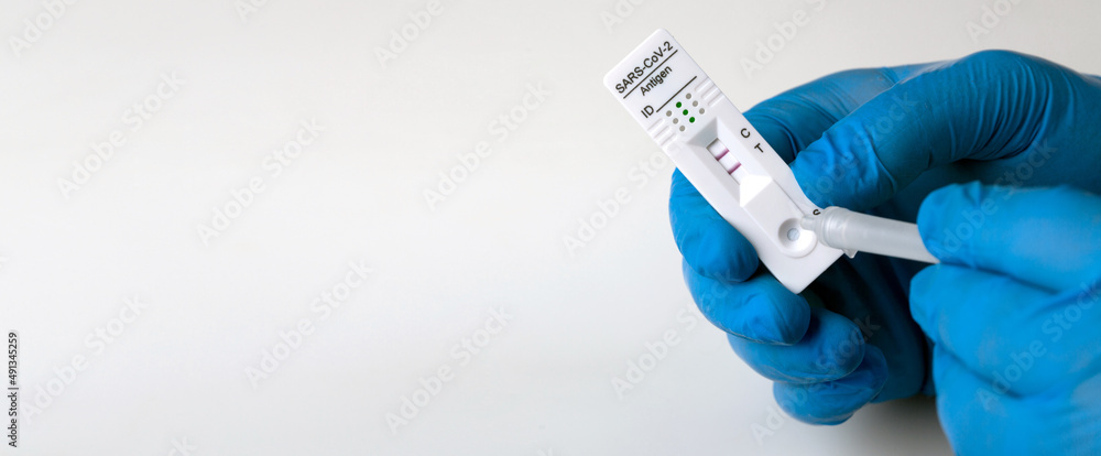 Positive test result by using rapid test device for COVID-19. Stock ...