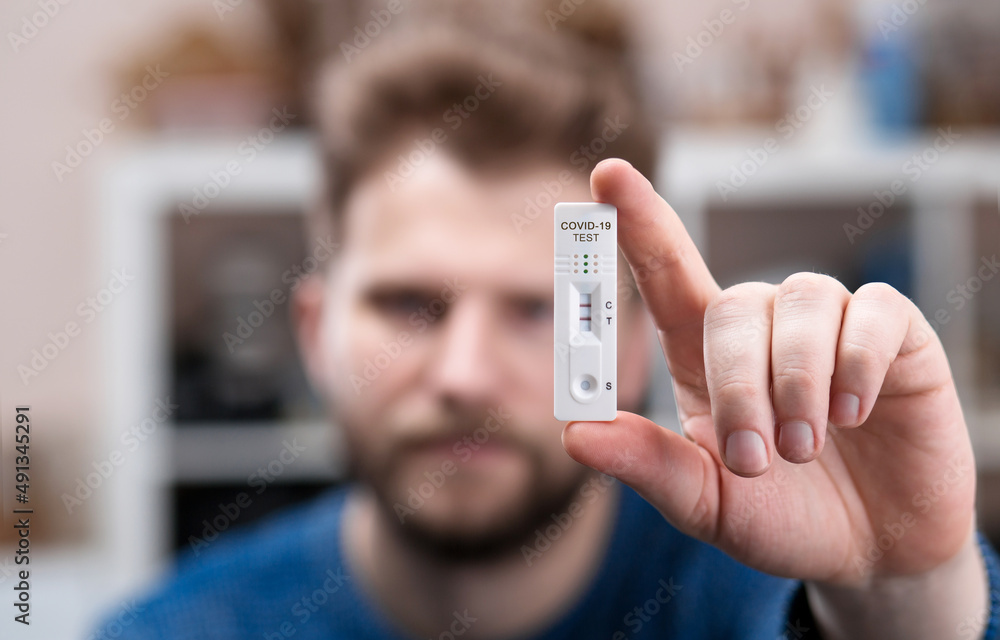 Positive test result by using rapid test device for COVID-19. Stock ...