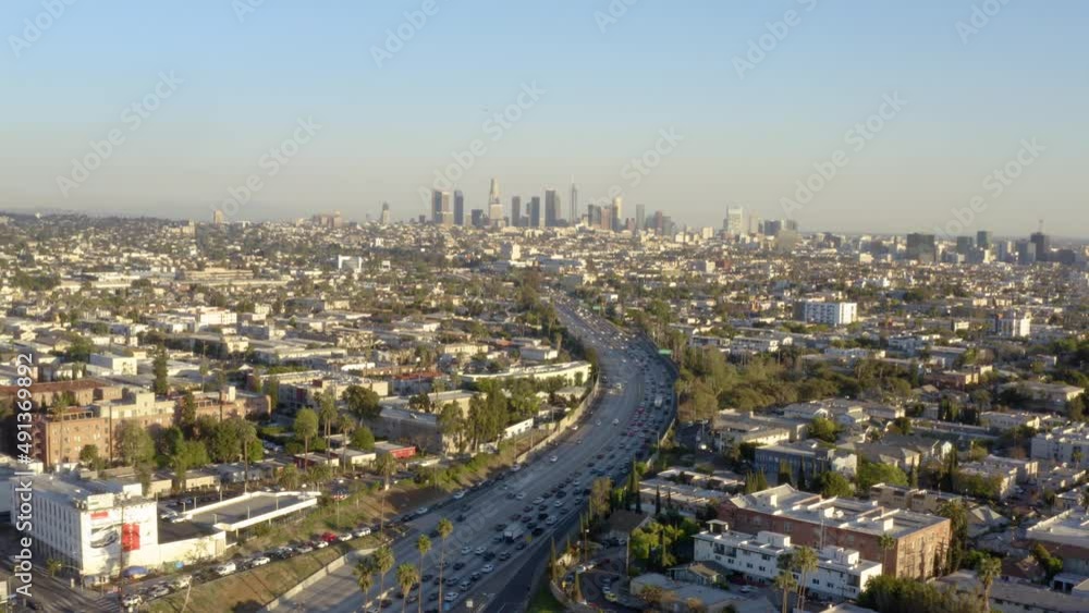 Aerial view Los Angeles freeway, cars and trucks on road traffic on ...