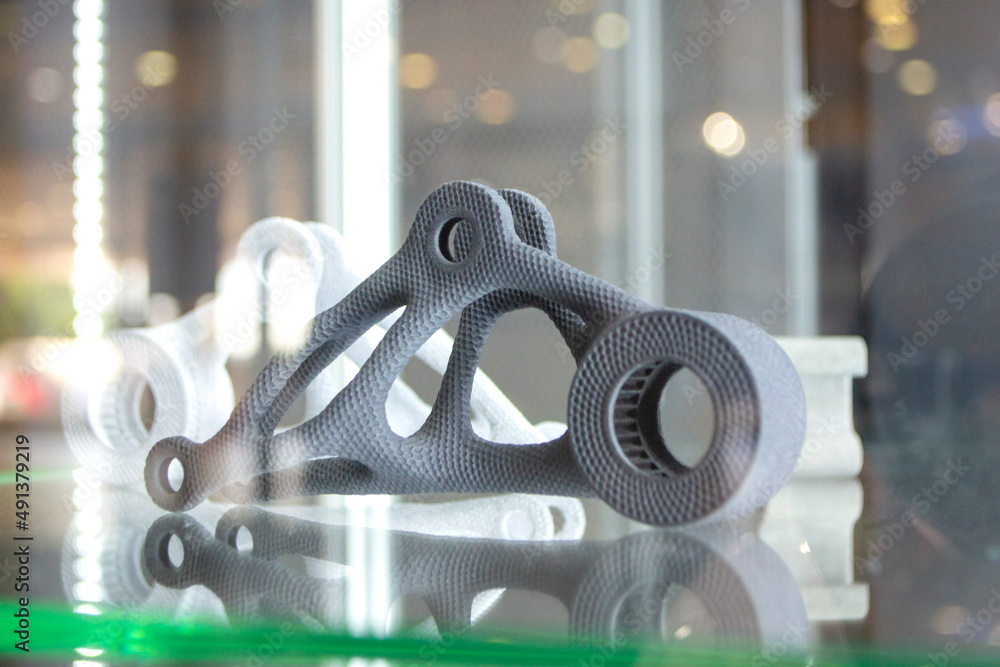 Model that printed on 3D printer. Powder industrial 3D printer printed ...