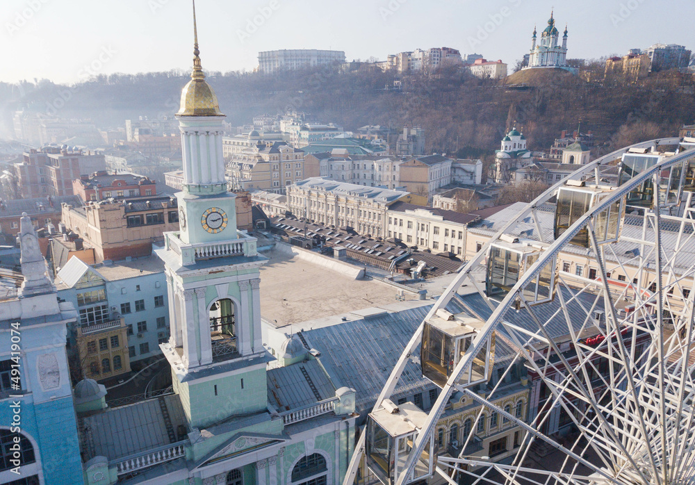 Top view of the ferris wheel at Kontraktova square and historic ...