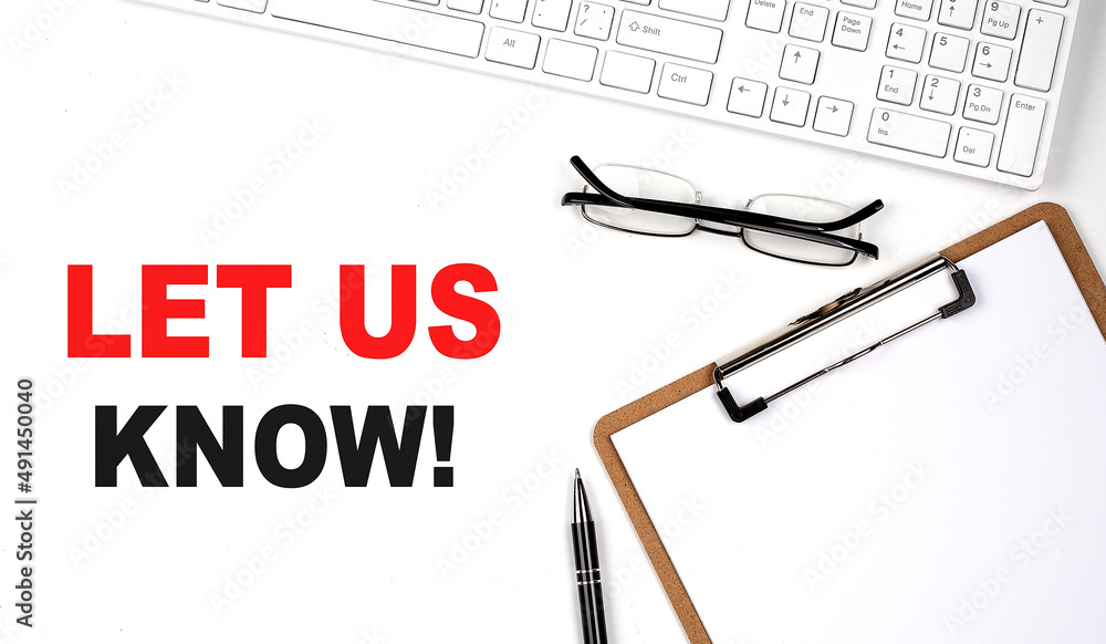 LET US KNOW text written on the white background with keyboard, paper ...