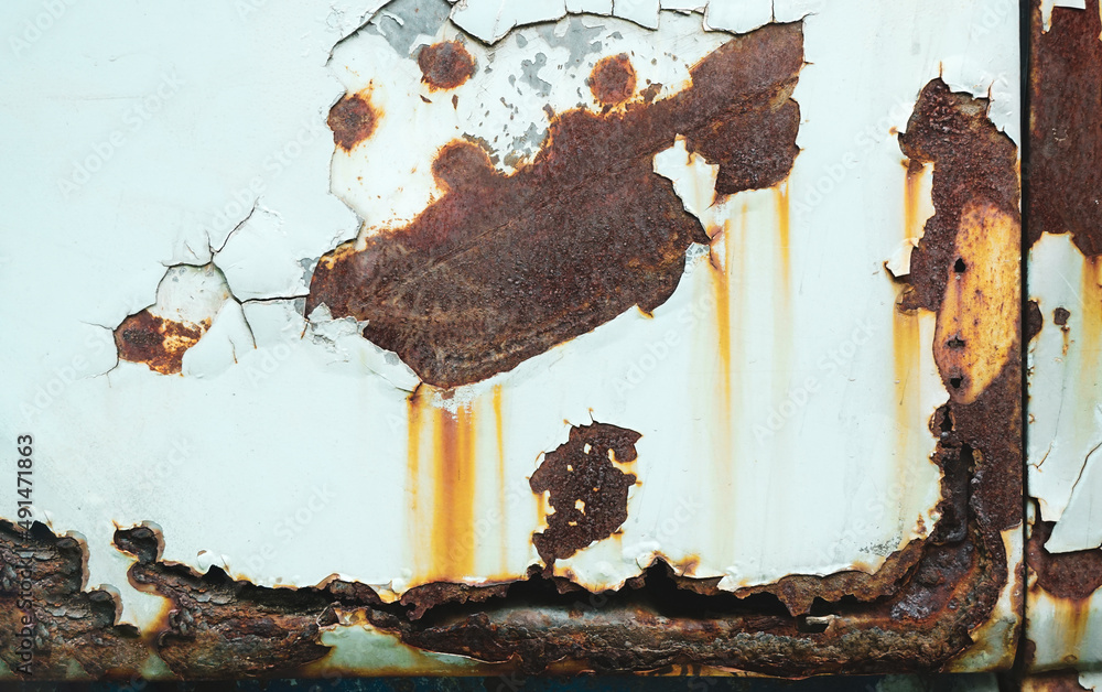 Rust of metals.Corrosive Rust on old white iron oil tank.Use as ...