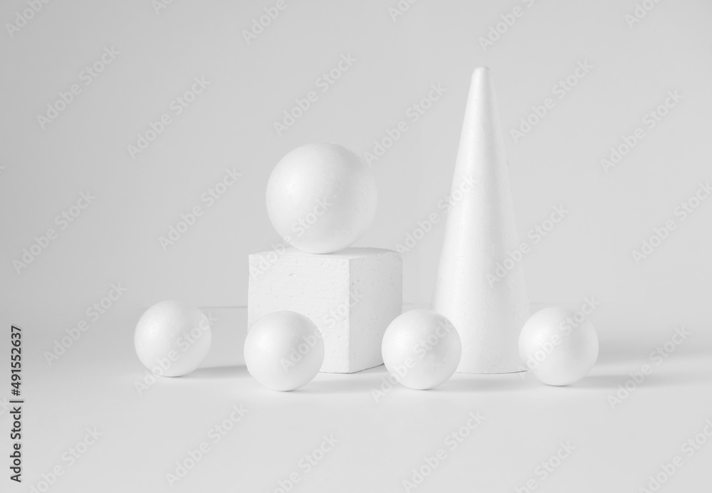 Monochrome composition of various 3d geometric shapes. White balls of ...