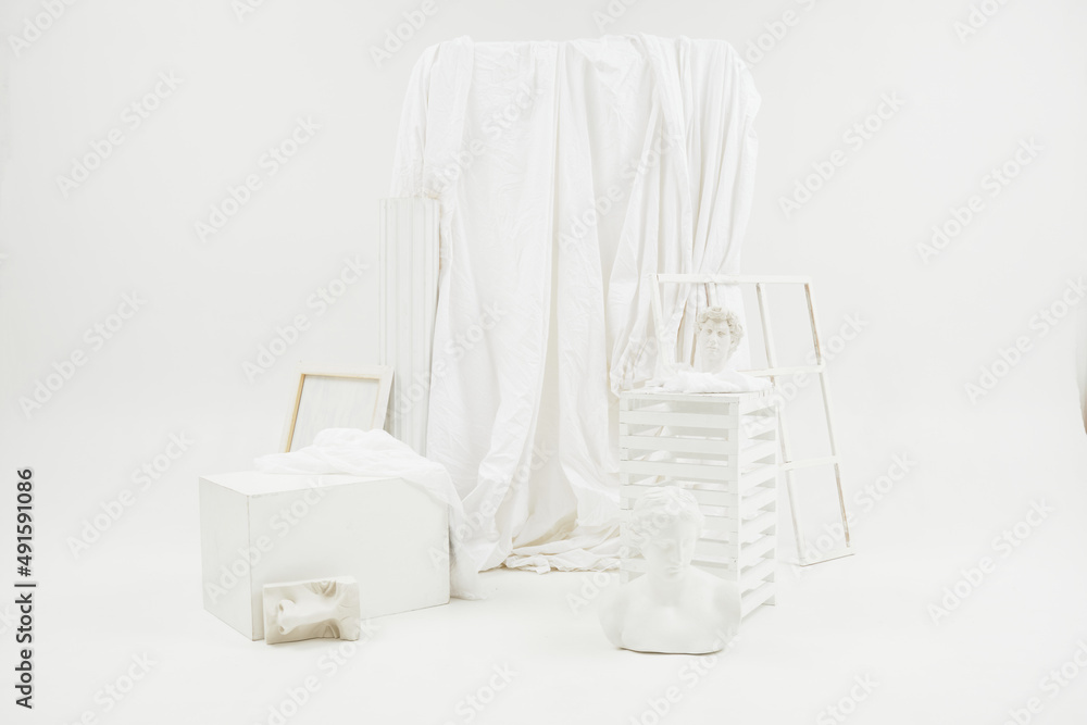 a composition of drapery made of fabric with curbstones and plaster ...