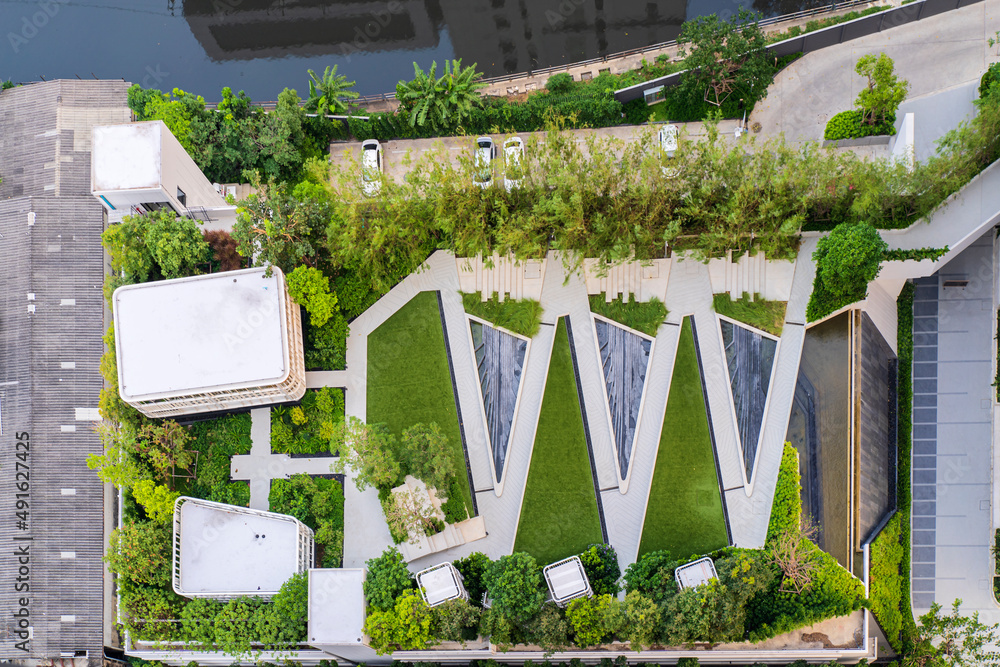 Aerial view of rooftop garden in urban residential area. Amazing park ...