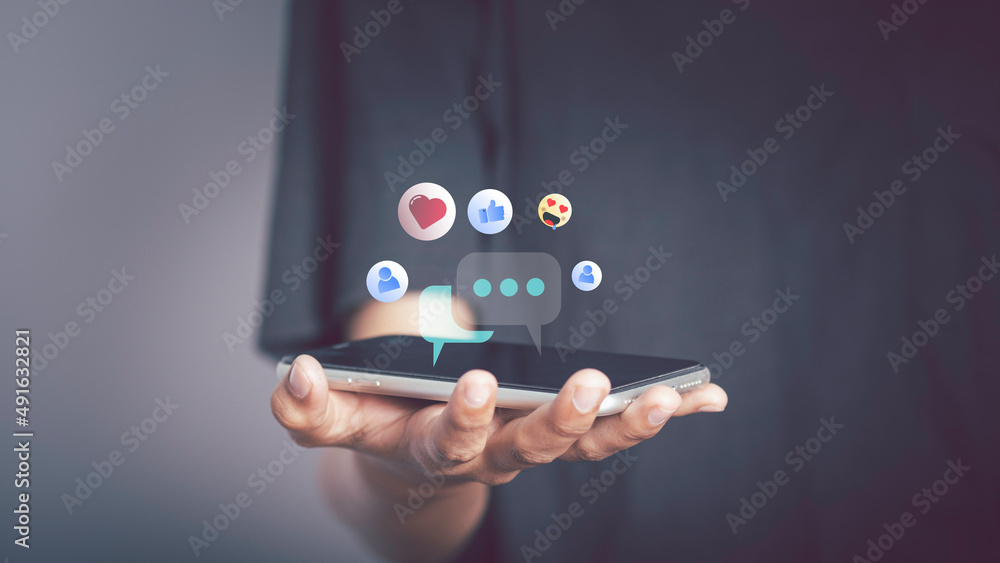 Live Chat on Communication social network Concept. Person hand using ...