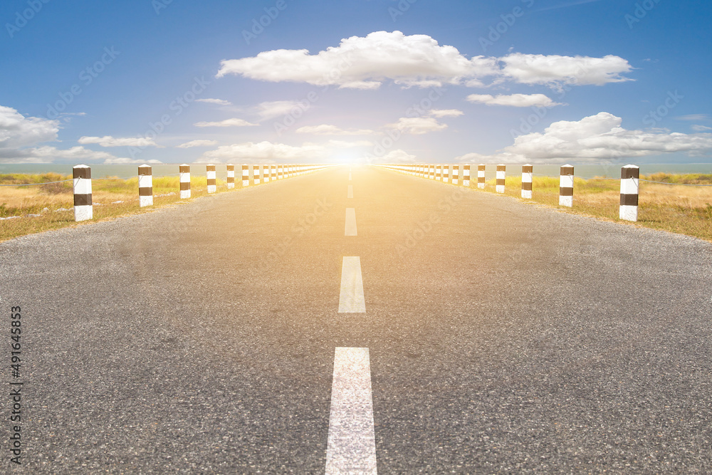 Milestones,black and white milestones with green grass roadside,lake ...