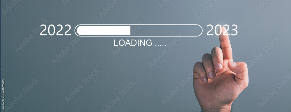 loading scale from year to year. from 2022 to 2023. man clicks on the ...