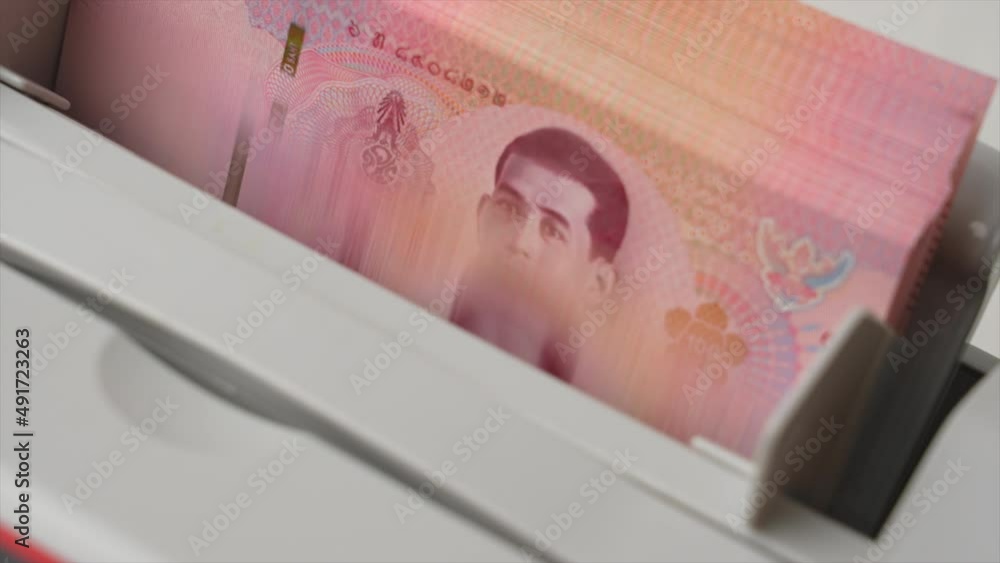 Thai Baht money counting in Machine. Paper THB Thai baht banknotes ...