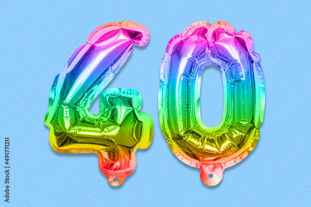 Rainbow foil balloon number, digit forty on a blue background. Birthday ...