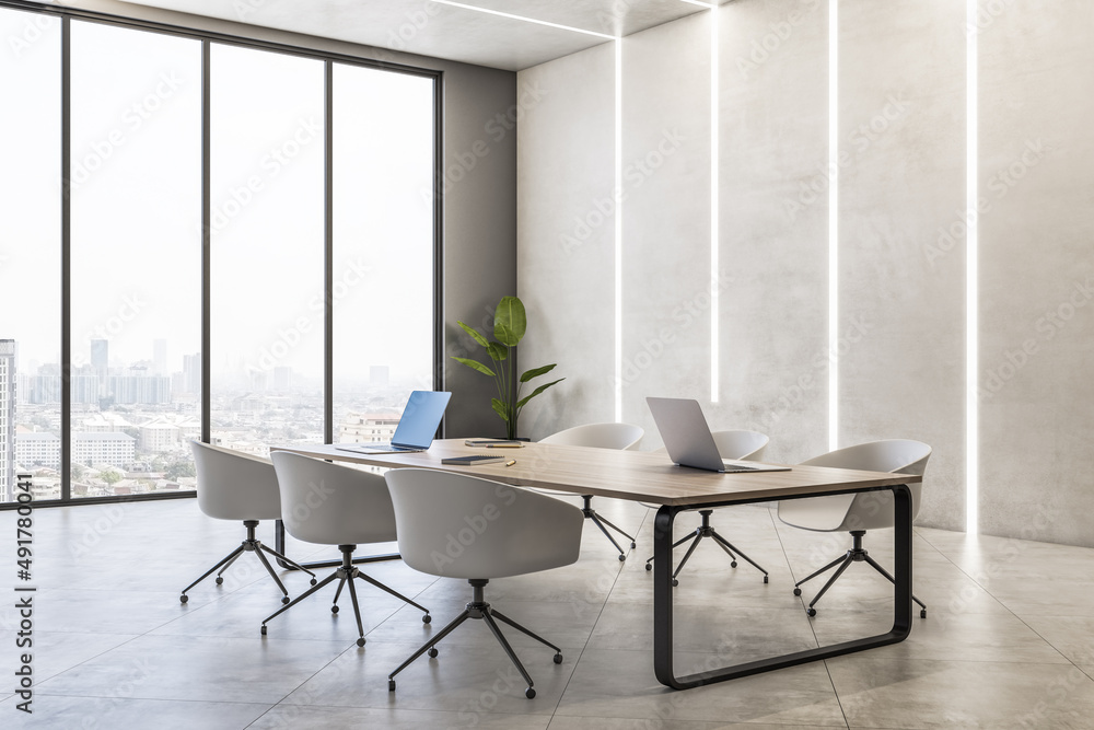 Bright concrete conference room interior with furniture and window with ...