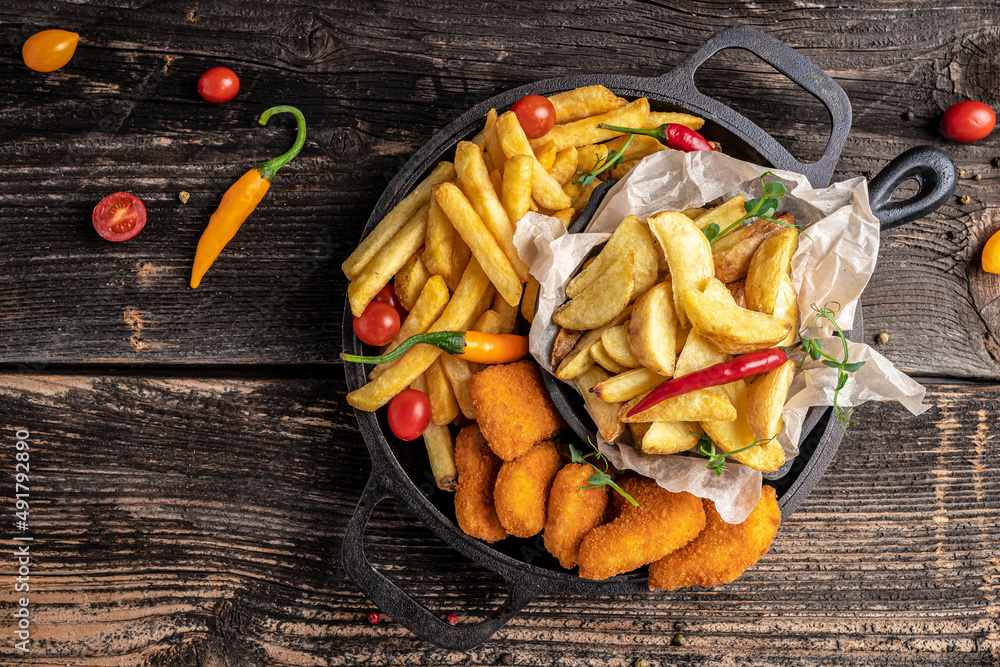 take away fast food products fried chicken with french fries and ...