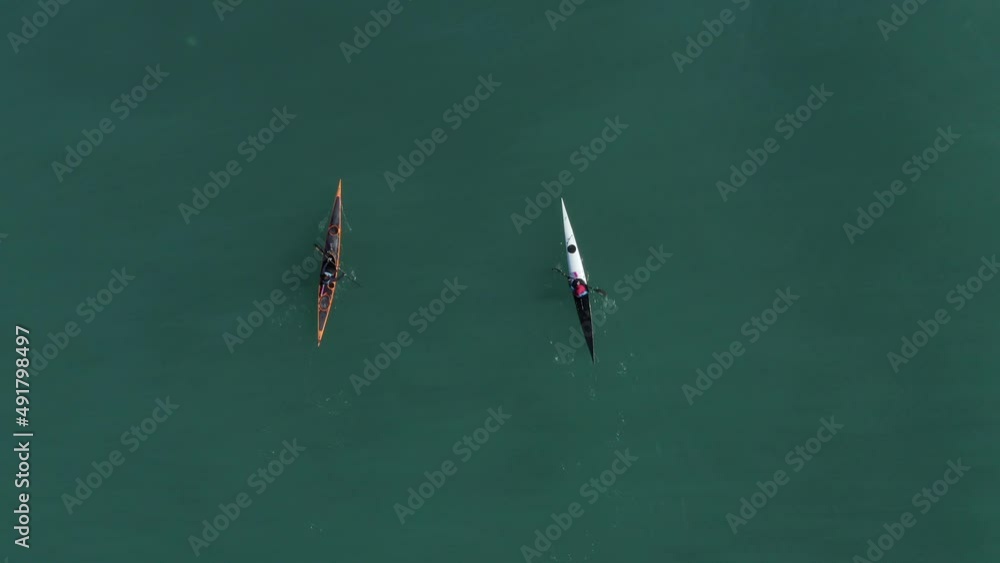 Single seat canoe rowing over a shallow lagoon, Aerial view. Stock ビデオ ...
