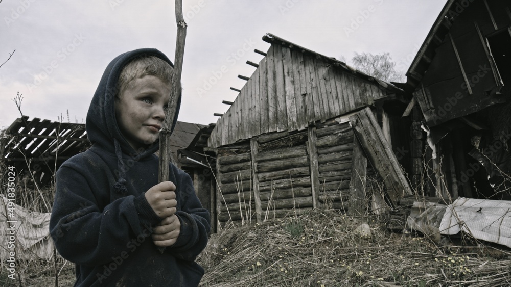 Child playing war in ruins Stock Photo | Adobe Stock