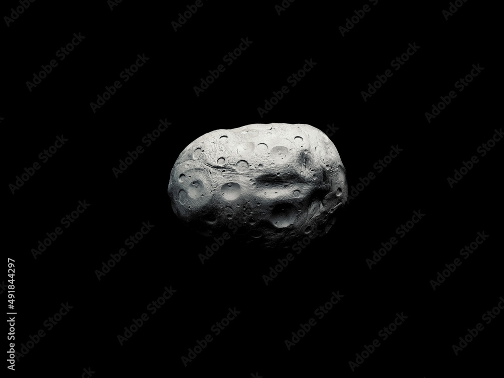 Asteroid covered with impact craters on a black background. Large ...