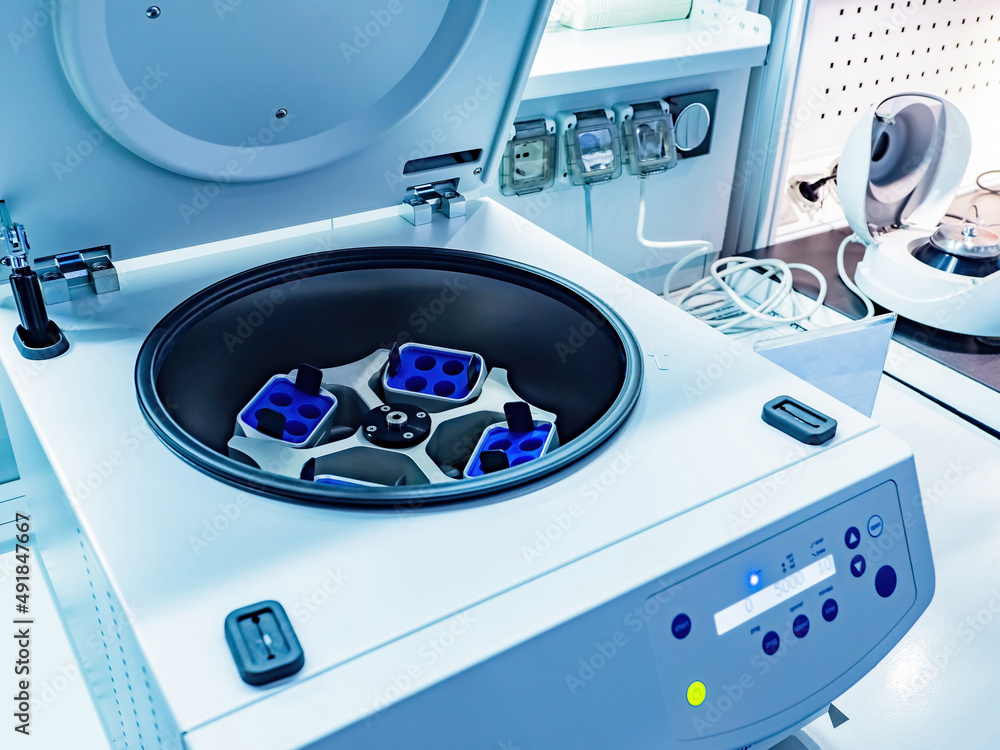 Laboratory equipment. Open laboratory centrifuge. White medical ...