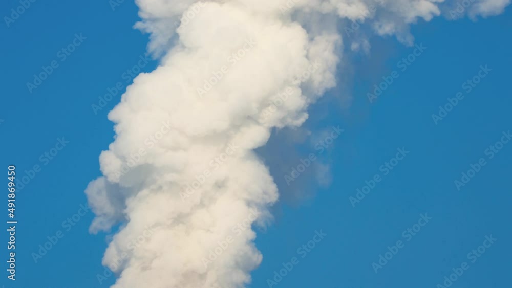 White smoke against blue sky. Video 4k resolution. Pollution of ...