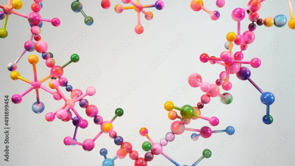 close up color of atom in heart shape. construction of molecular in ...