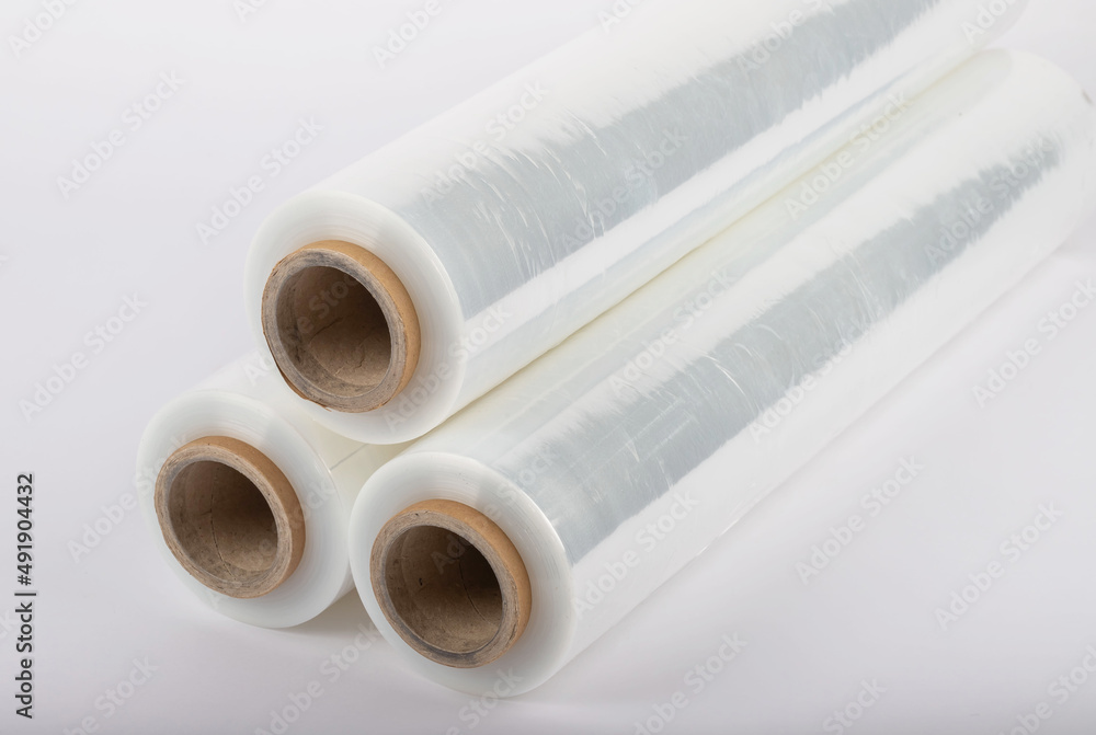 Roll of plastic stretch film with clear wrap. It stands in an isolated ...