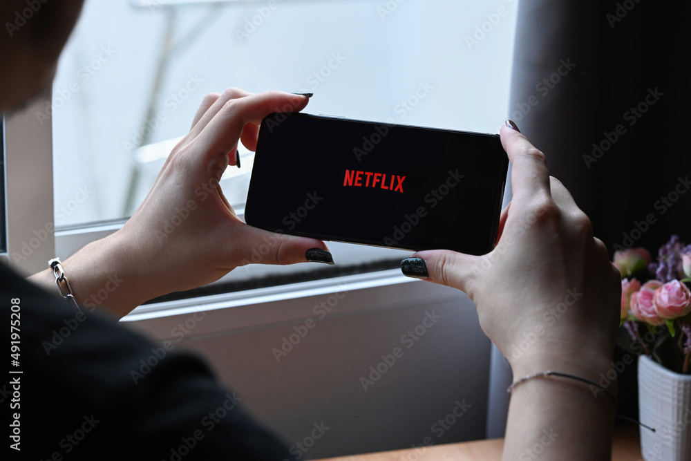 Chiang Mai, Thailand - Mar 01,2022: Woman holding smart phone with ...