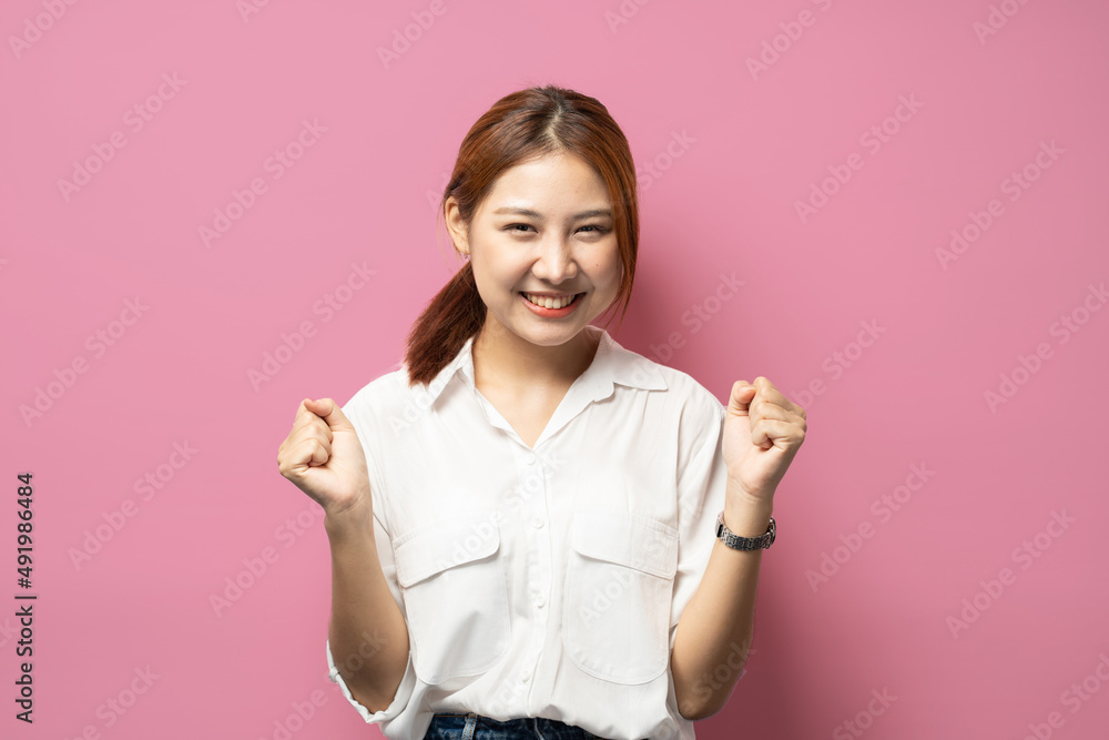 Hooray I did it. Successful lucky cute brunette woman jumping from ...