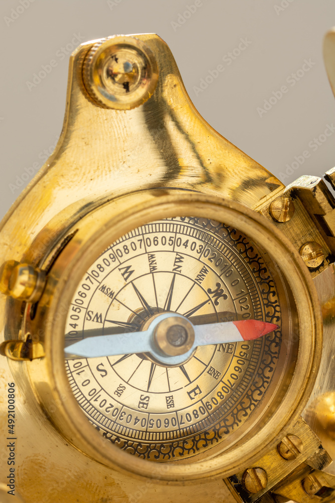 Detail of an antique maritime bronze solar compass Stock Photo | Adobe ...