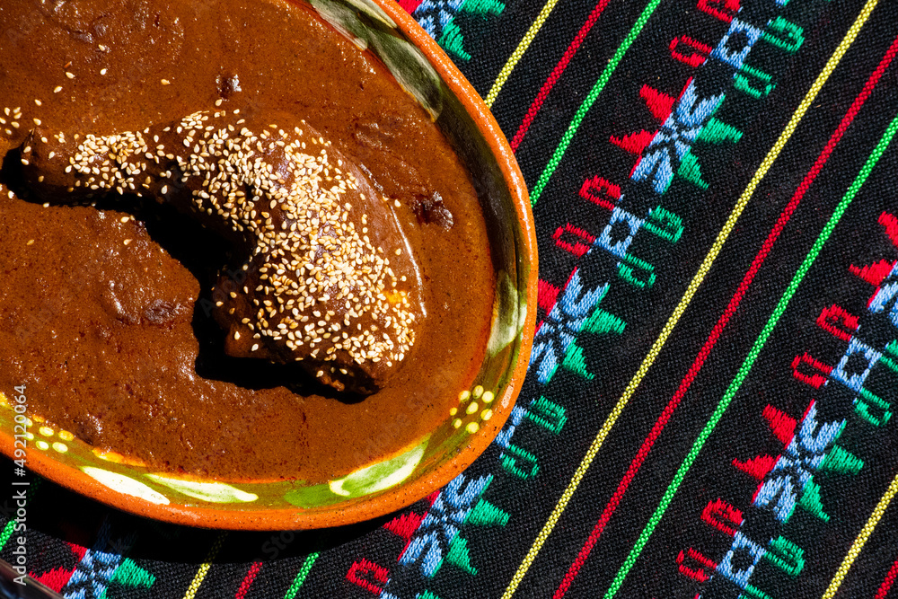 Typical Mexican food background known as Mole Poblano, decorated with ...