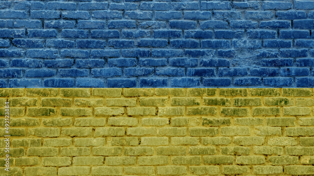 Flag of Ukraine on brick wall background on town street. Exterior stone ...