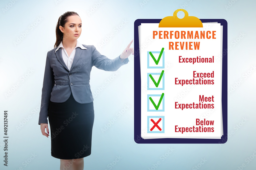 Annual performance review concept with businesswoman Stock Photo ...