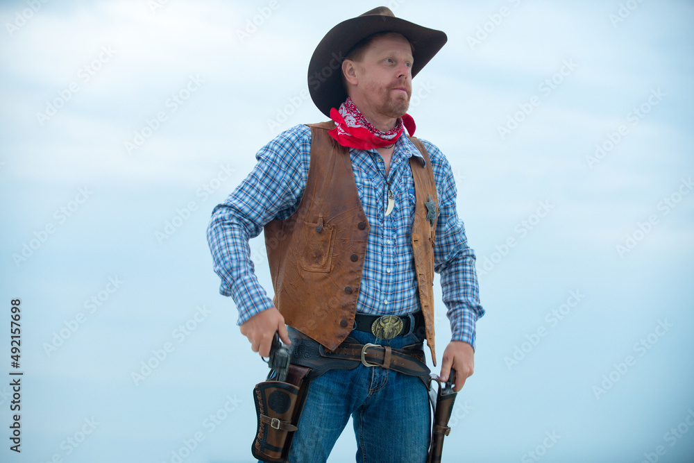 Cowboy in cowboy hat. Wild west, western, man with vintage pistol ...