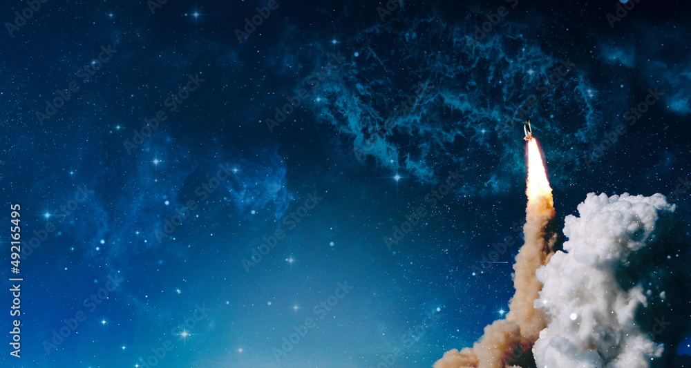 Spaceship flight. Starry sky and blue galactics. View on space shuttle ...