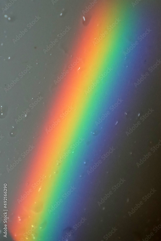 Physics spectrum of light multicolor. Oblique rainbow. The phenomenon ...