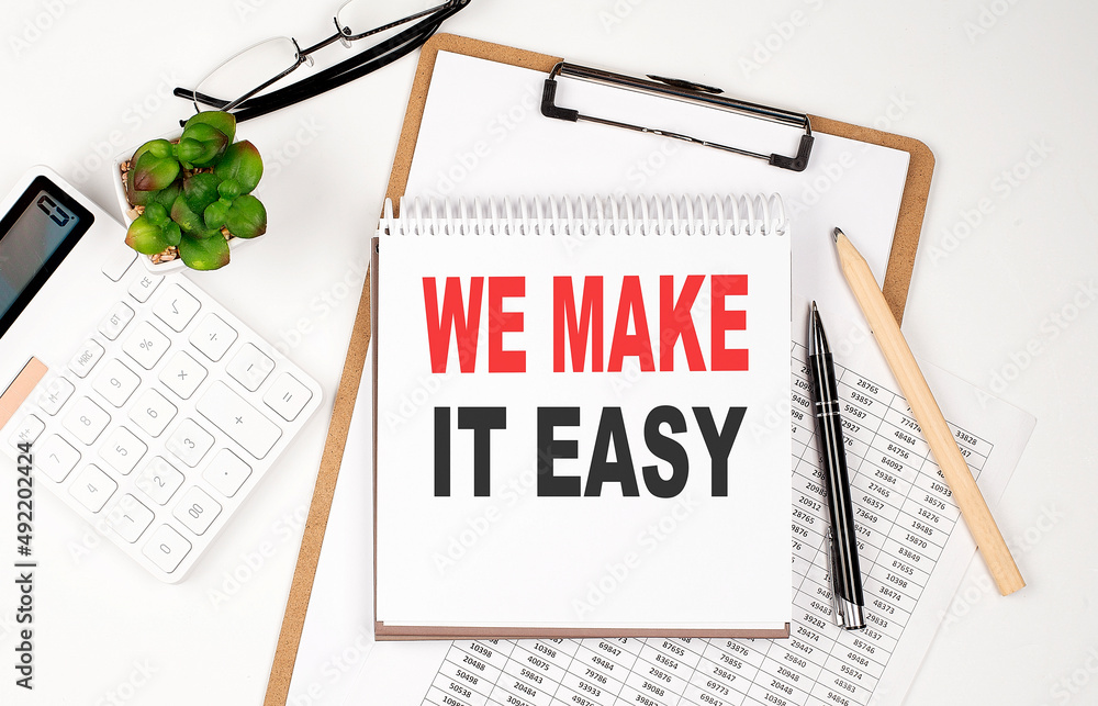 Office desk table with paper sheet, notepad ,chart and calculator. Top ...