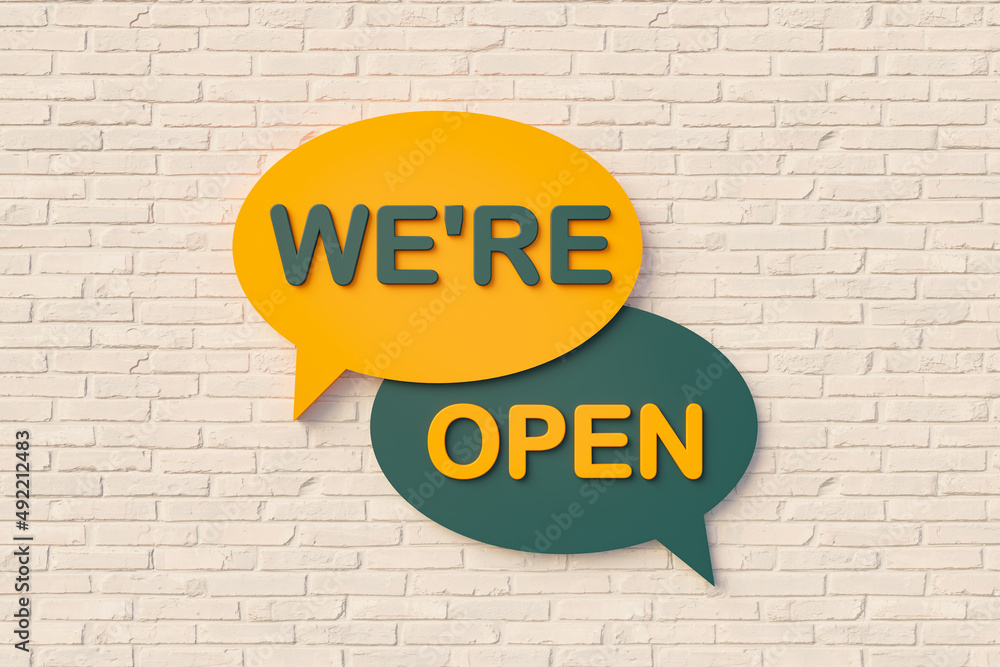 We're open. Sign, speech bubble, text in yellow and dark green against ...