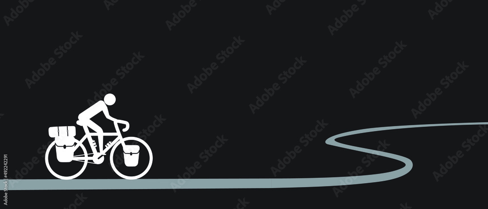 Rider cycling touring bike with bikepacking bags and tent on black ...