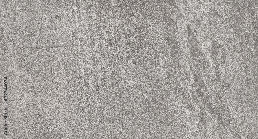 bright grey slate background or texture. close up ceramic stone tile ...
