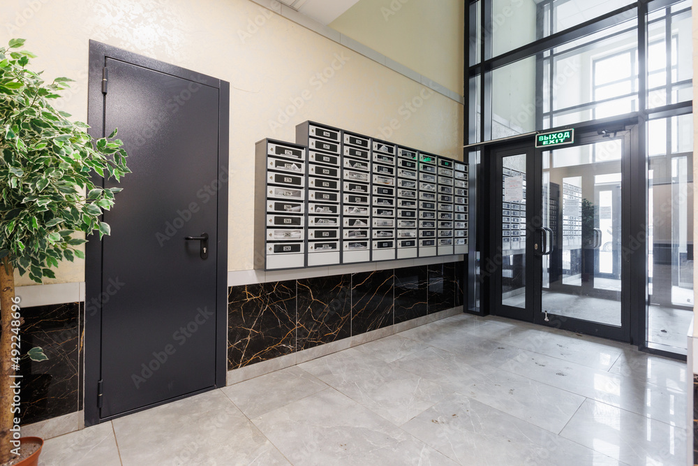 mailboxes in the lobby of an apartment building Stock Photo | Adobe Stock