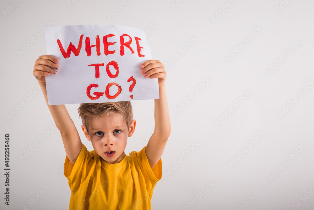 Sad little boy asking where to go? refugees on migration move. Boy ...