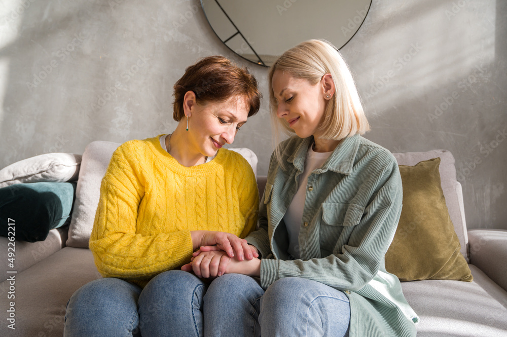 Mother and adult daughter having tender momnet. Mum and child ...