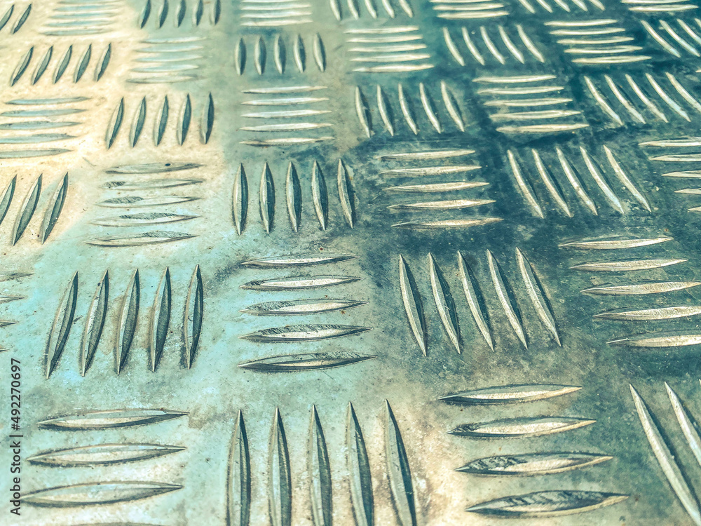 texture, a piece of black metal. background with notches, scratches and ...