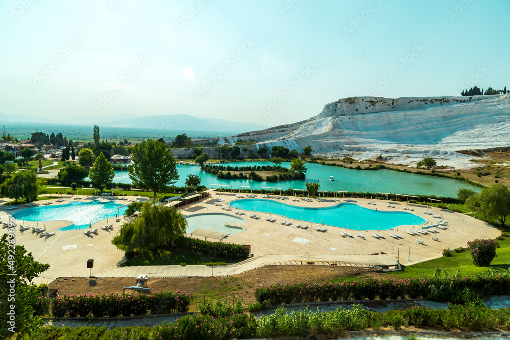 Natural travertine pools and terraces in Pamukkale. Cotton castle in ...